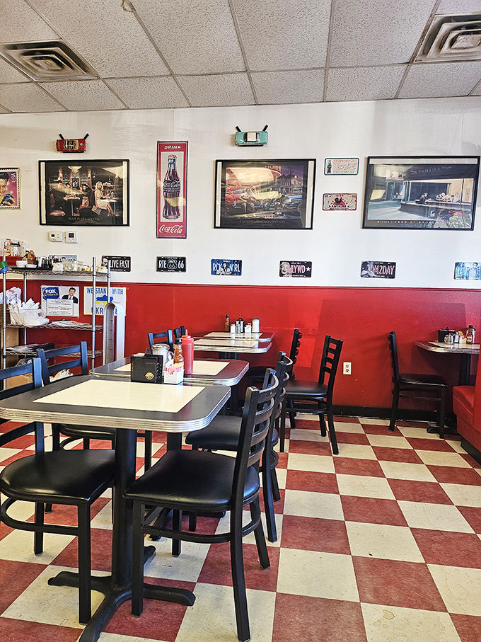 Classic red and white checkerboard floors set the stage for breakfast theater, where every table feels like the best seat in the house.