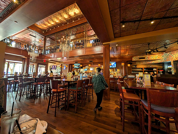 Two-story splendor with ornate tin ceilings and warm wood tones that whisper, "Stay awhile." The French Quarter vibe is strong enough to make you check for beads around your neck.