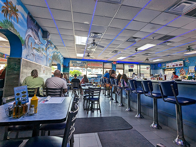 Ocean blues and underwater murals transform this humble eatery into an aquatic escape. The counter seating puts you front-row for the seafood symphony about to unfold.