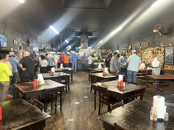 Smoke-blackened walls tell stories older than some patrons. This dining room has witnessed more food euphoria than a cooking competition judge.