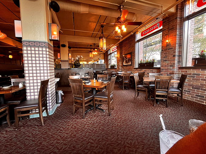 Warm brick walls, wooden tables, and checkered accents create that perfect "fancy but not too fancy" vibe where memorable meals happen.