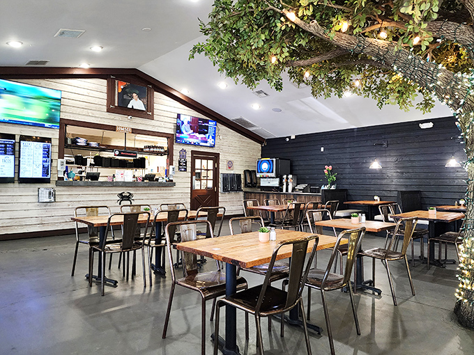 Inside, wooden booths and green accents create that perfect diner atmosphere where coffee flows freely and breakfast dreams come true.