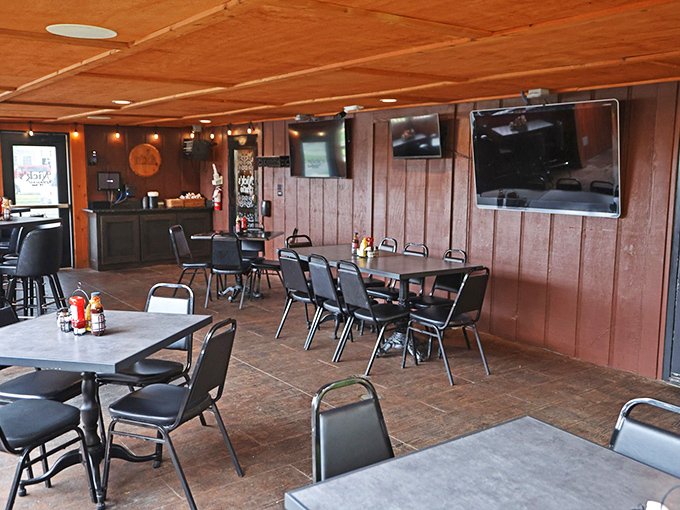 Wood-paneled walls and simple furnishings create that perfect "everybody knows your name" vibe where comfort food meets comfortable atmosphere.