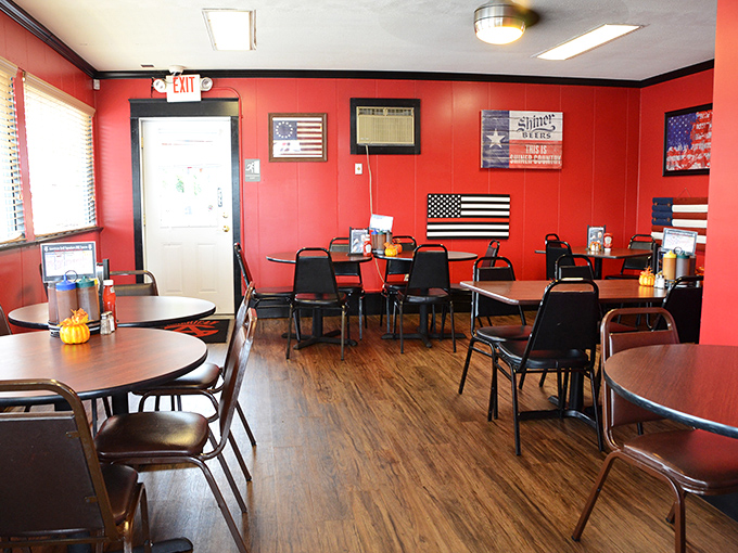 Red walls adorned with American flags create the perfect backdrop for BBQ feasting. It's like eating in a patriotic hug that smells of smoke and spices.
