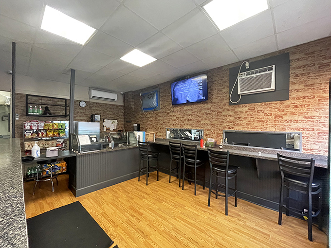 Exposed brick walls and simple counter seating create the perfect stage where the sandwiches are undeniably the stars of the show.