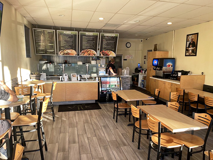 Simple wooden tables and menu boards create a no-frills atmosphere where the food takes center stage. This isn't about the decor&mdash;it's about the flavors.