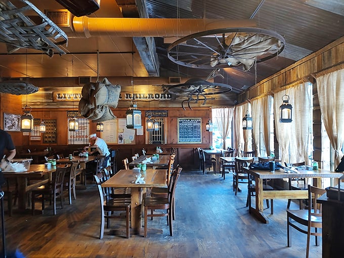 Step into a time machine disguised as a restaurant, where wagon wheels overhead and rustic wooden tables set the stage for mountain-sized morning feasts.