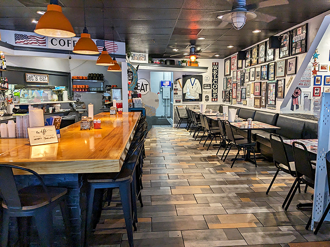 Inside, the diner's warm wood counter and patriotic decor create that perfect "everybody knows your name" atmosphere where coffee refills arrive before you ask.