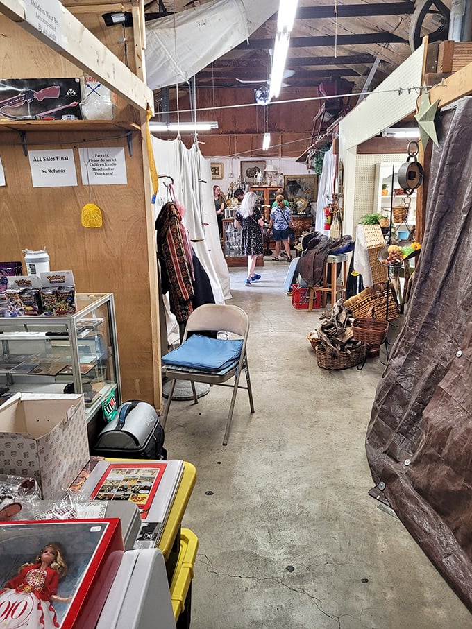 Narrow pathways lead to unexpected discoveries as shoppers navigate the indoor labyrinth. That folding chair isn't for sitting&mdash;it's for when you need a moment to contemplate your next vintage acquisition. 