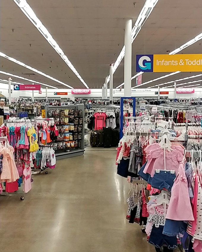 A retail wonderland stretches to the horizon under fluorescent lights. The hunt begins in this labyrinth of potential finds
