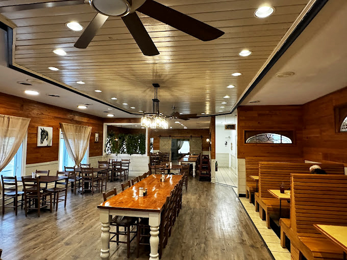 Wooden paneling, farmhouse tables, and that unmistakable aroma of possibility&mdash;this dining room knows comfort isn't just about the food. 