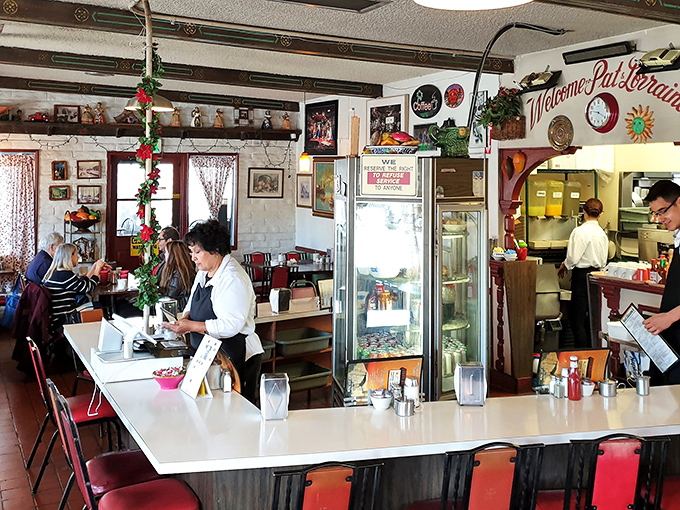 Rustic wooden beams frame the bustling bar area where locals and travelers alike gather. This isn't manufactured charm—it's the real deal, aged to perfection like a fine bourbon.