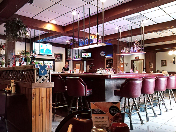 Pull up a burgundy bar stool and settle in. This isn't just a counter—it's front-row seating to the greatest show in Lebanon: comfort food perfection.