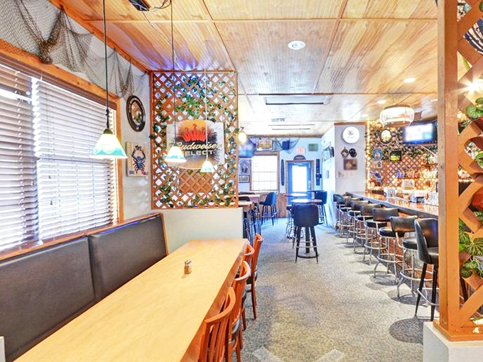 Inside, wooden lattice dividers and nautical touches create that perfect "Florida seafood joint" vibe without going overboard on the maritime kitsch.