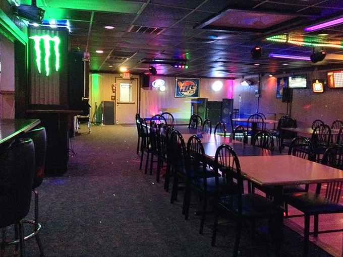 Colorful lights transform this casual dining space into something between neighborhood hangout and disco fever dream&mdash;all that's missing is John Travolta.