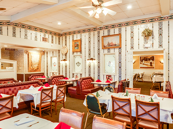 Step inside and time stands still &ndash; those red leather booths have cradled generations of diners while the striped wallpaper creates the perfect backdrop for Italian-American nostalgia.