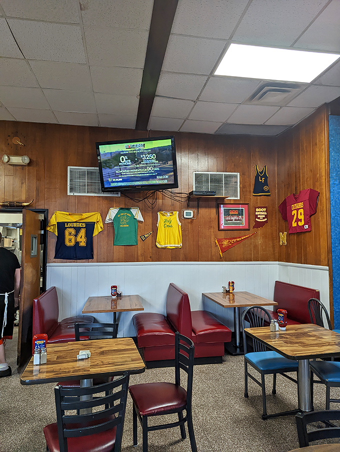 Where sports memorabilia meets red vinyl booths &ndash; this isn't retro by design, it's authentic by survival.