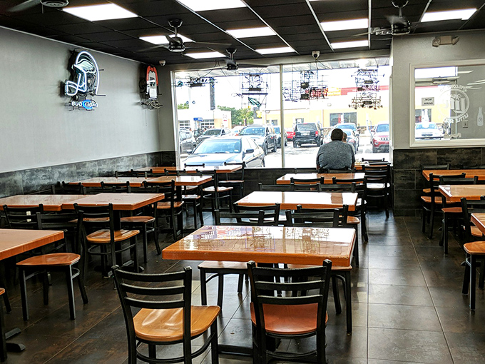 Simple wooden tables, sports memorabilia, and zero pretension. The dining room says "we're serious about food, not decor" &ndash; and that's exactly how it should be.