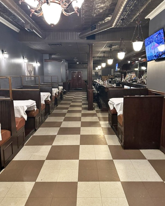 Classic checkered floors and wooden booths create that perfect old-school steakhouse vibe &ndash; where memories are made between bites of perfectly aged beef.