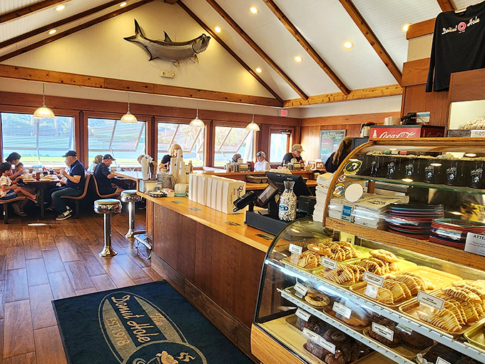 Wooden beams, mounted fish, and the promise of donuts. It's like someone built a restaurant based on my personal heaven.