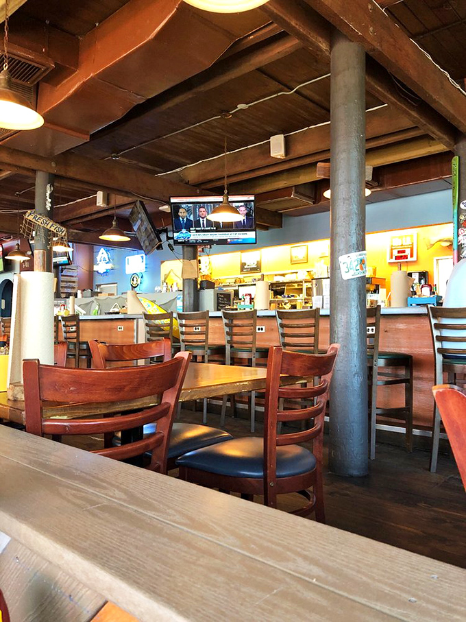 Wooden beams, sturdy columns, and comfortable seating create that authentic "been-here-forever" vibe that no corporate designer could replicate.