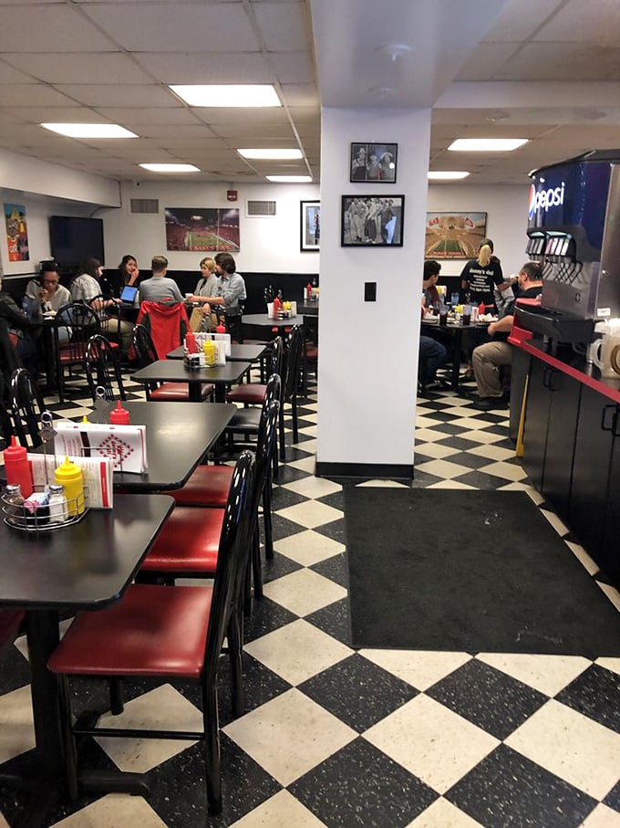 The classic black and white checkered floor says "authentic deli" before you even glimpse the menu. Nostalgia served with every meal.