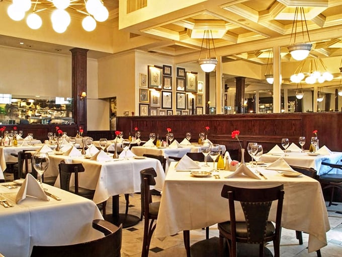 White tablecloths, rich wood paneling, and that magnificent coffered ceiling&mdash;this isn't just a restaurant, it's a time machine to when dining was an event.