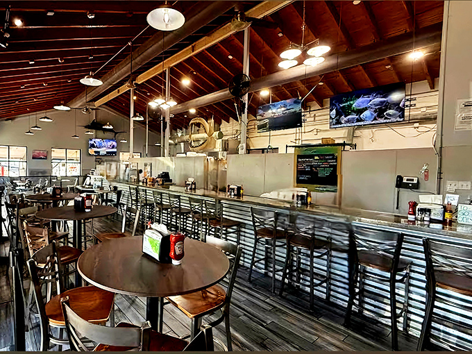 Exposed wooden beams and casual seating create that perfect "I've discovered something authentic" vibe. The kind of place where calories don't count because you're on vacation.