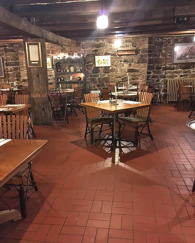 Step inside and time slows down. Exposed stone walls, wooden beams, and terra cotta floors create an atmosphere that whispers stories from America's earliest days.