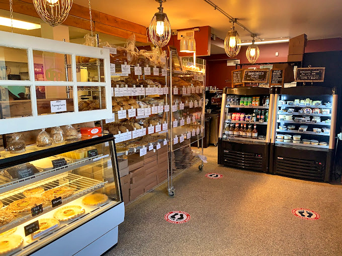 Step inside and you're transported to bread heaven, where industrial lighting meets artisanal dreams beautifully.