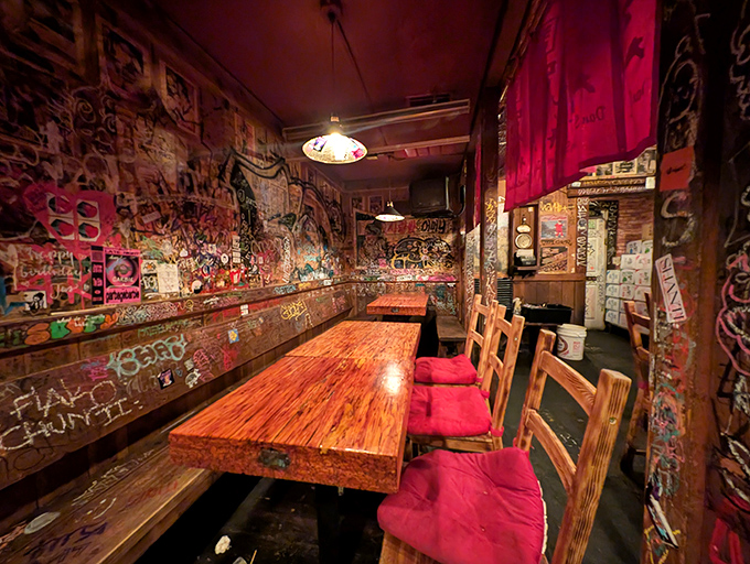 Graffiti-covered walls tell the stories of countless nights of revelry. These wooden booths have witnessed more meaningful conversations and food epiphanies than most therapists' couches.