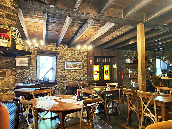 Where wooden beams tell stories overhead and stone walls hold secrets, Penn's Tavern's interior feels like stepping into a living history book with better food.