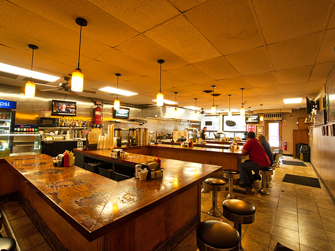 The heart of any great diner is its counter, where strangers become friends and the sizzle of the grill provides life's most comforting soundtrack.