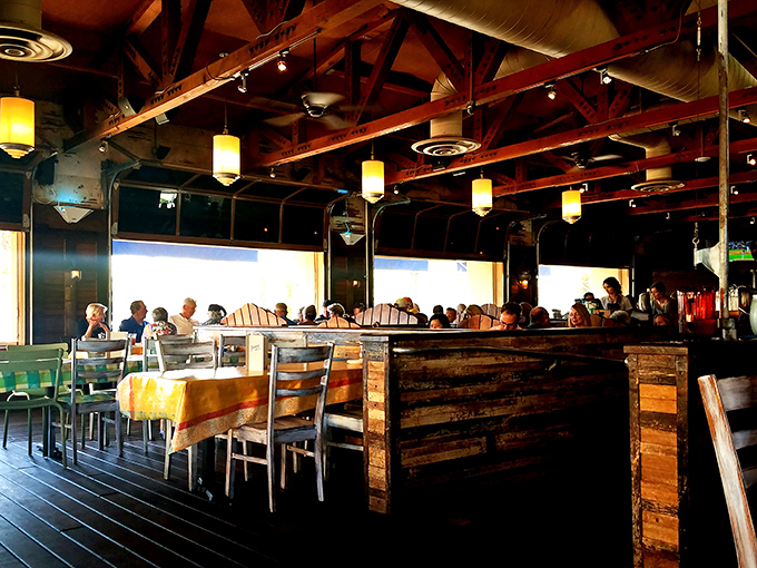 Exposed wooden beams and warm pendant lighting create that "fancy beach shack" vibe where you can dress up or down&mdash;just like your favorite seafood.