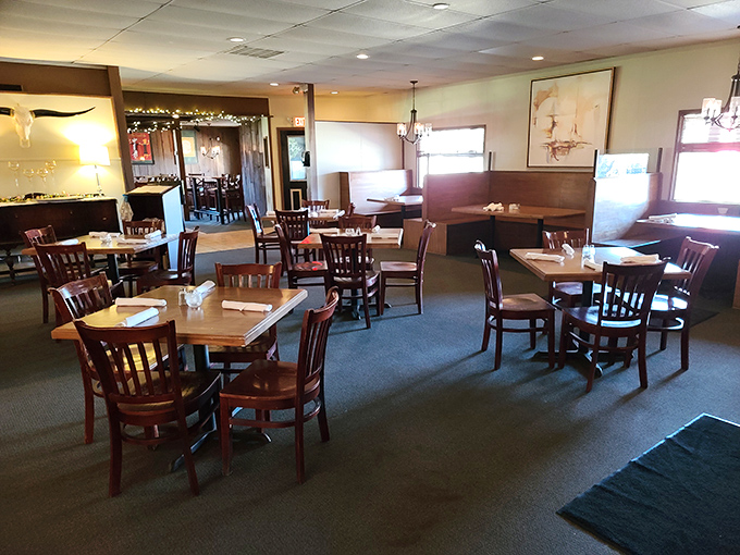 Inside, wooden tables and chairs create that perfect balance of casual comfort and rustic charm&mdash;a dining room that feels like coming home.