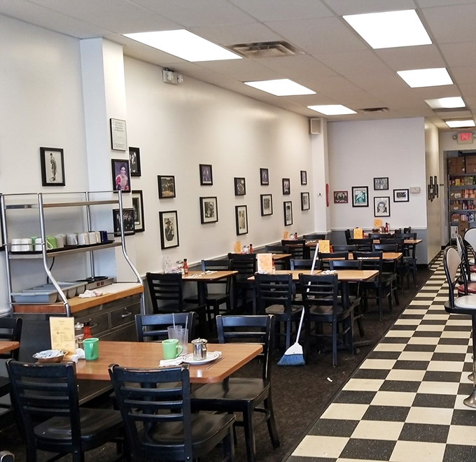 Classic black and white checkered floors set the stage for breakfast theater, where every table tells a different delicious story.