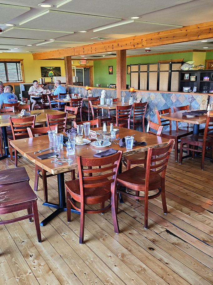 Warm wooden beams, natural light, and live-edge tables create a dining room that feels like the world's most delicious treehouse. Comfort meets sophistication in perfect harmony.
