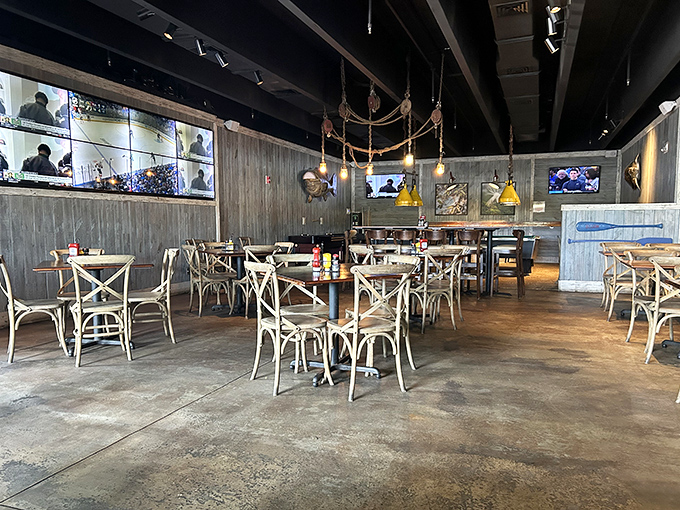 Industrial chic meets coastal comfort in a dining room that whispers "stay awhile" to every guest.