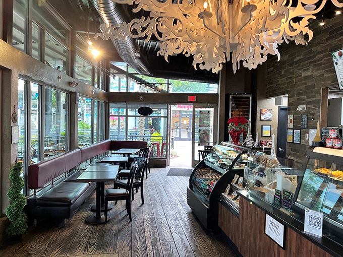 Step inside to discover rustic wood floors, exposed brick, and a chandelier that would make any interior designer swoon with envy.