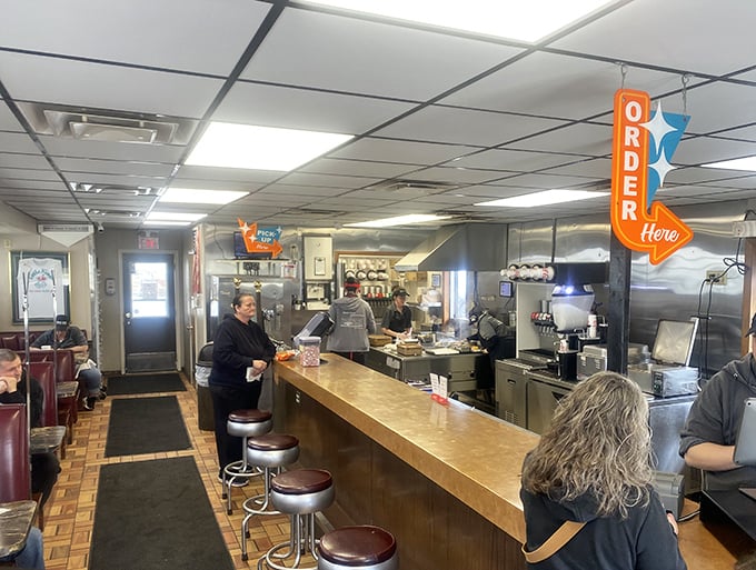 Where sandwich magic happens. The counter seating offers front-row tickets to the loose meat spectacle, complete with swiveling stools and nostalgia.