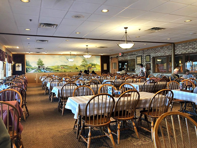 Inside, Windsor chairs and pastoral murals create an atmosphere that whispers, "Slow down, put away your phone, and prepare for food that demands your full attention."