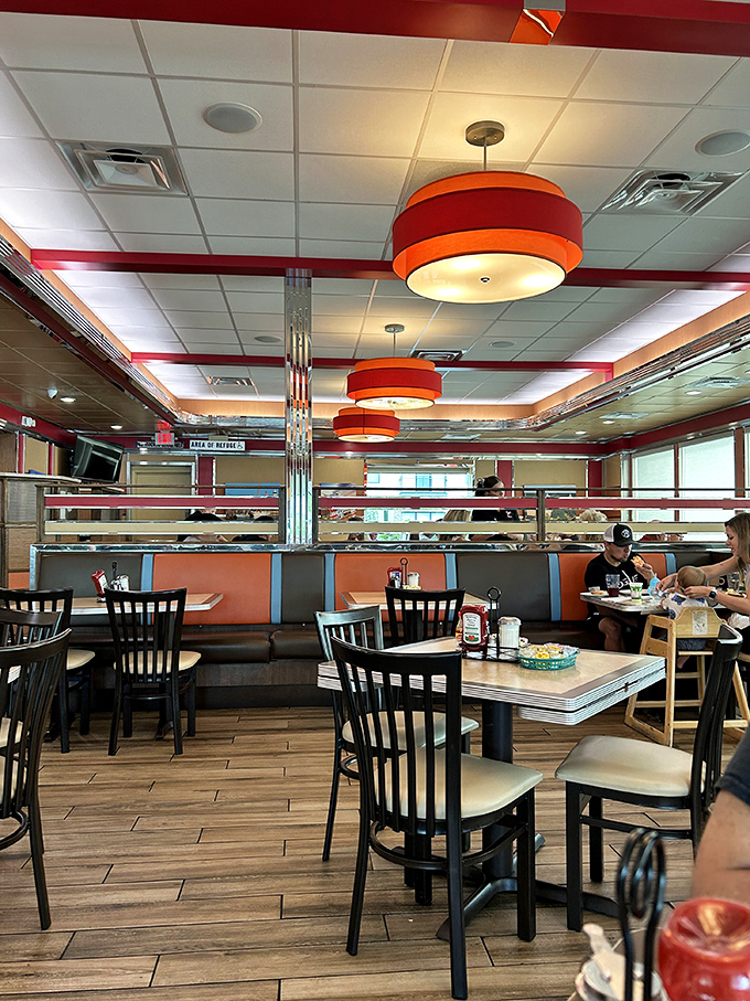 Step inside where red vinyl booths and chrome fixtures create the perfect backdrop for morning magic.