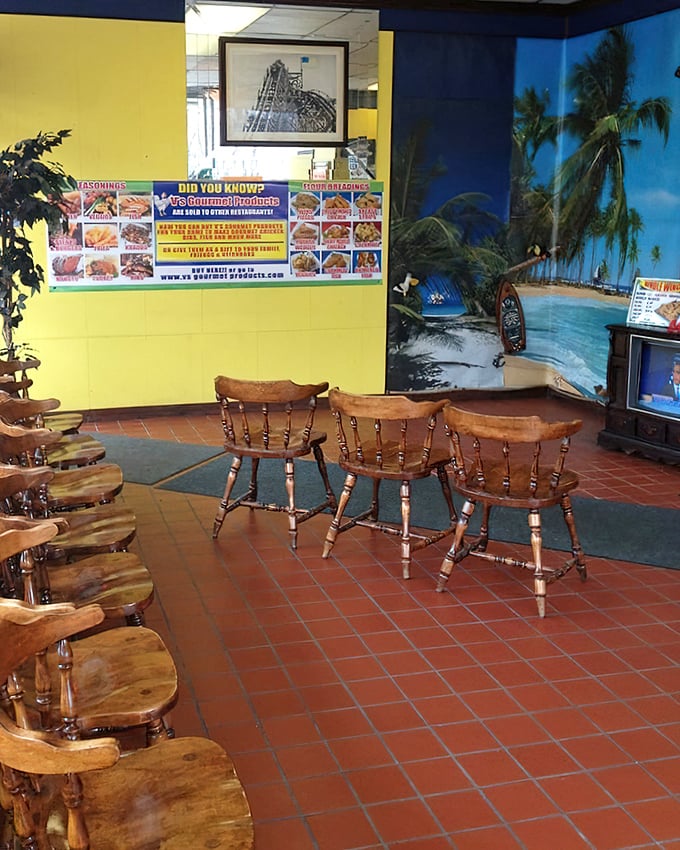 Beach vibes in Cleveland? The tropical mural and wooden chairs create a quirky oasis where comfort food meets vacation mindset.