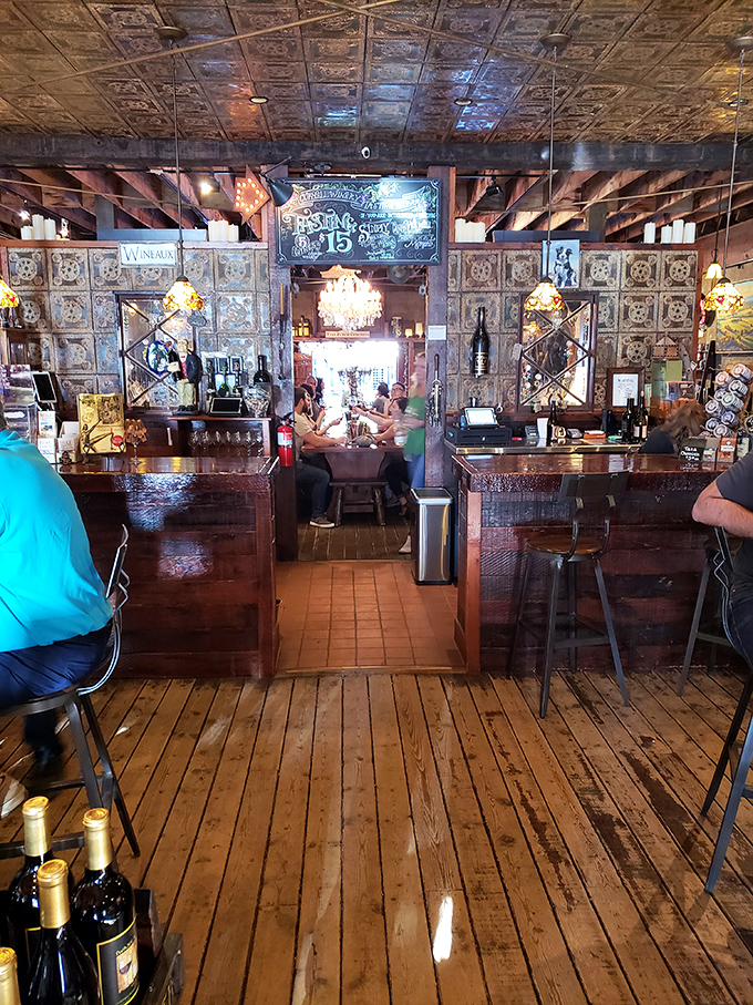 Step inside and the modern world melts away. The pressed tin ceiling, ornate tile work, and wooden bar create an atmosphere where every meal feels like a special occasion.