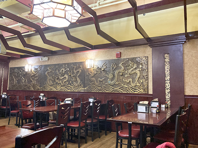 Dragons dance across ornate wall carvings while hexagonal lanterns cast a warm glow&mdash;proof that ambiance and all-you-can-eat aren't mutually exclusive concepts.