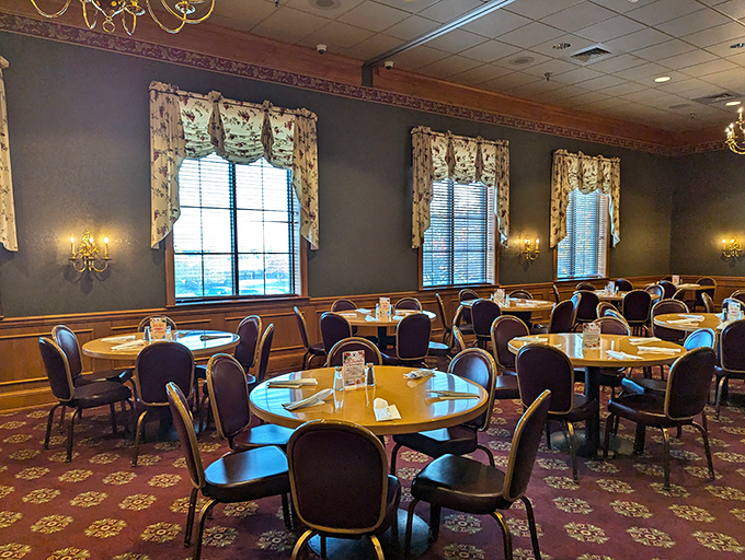 Those chandeliers and warm wood tones create the kind of dining atmosphere that makes every meal feel special.