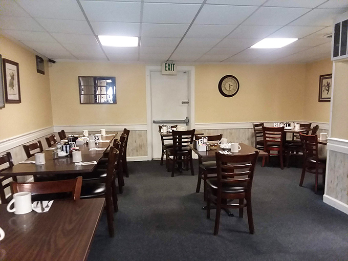 Inside, cream-colored walls and wooden tables create that "grandma's dining room" feel where breakfast dreams come true.