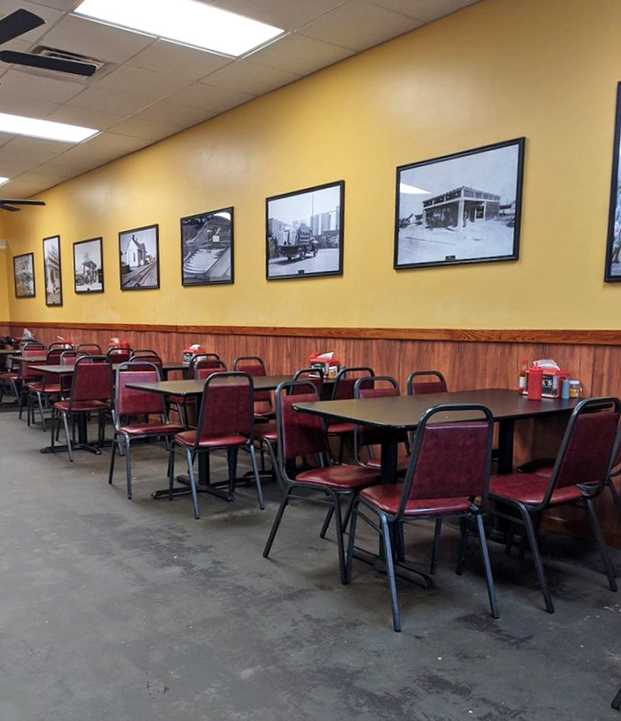 Yellow walls and burgundy chairs create the perfect backdrop for life-changing sandwich decisions and decades of satisfied sighs.
