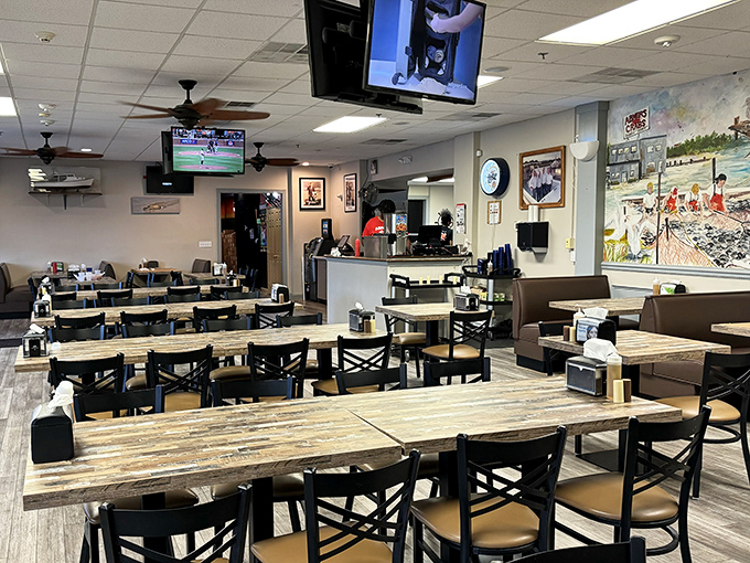 Simple wooden tables await the coming seafood storm. In Maryland, fancy tablecloths just get in the way of proper crab demolition.