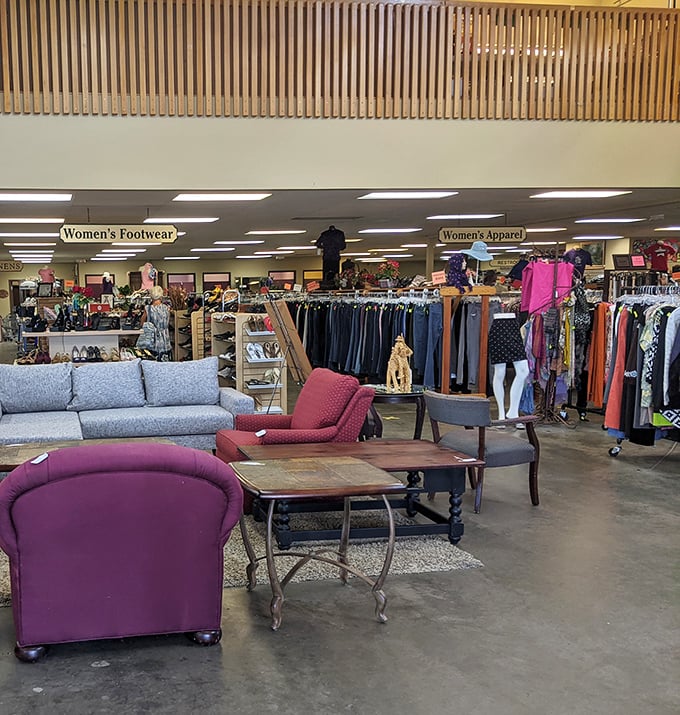 A purple armchair and endless racks prove that one person's "goodbye" is another's "hello, gorgeous!"